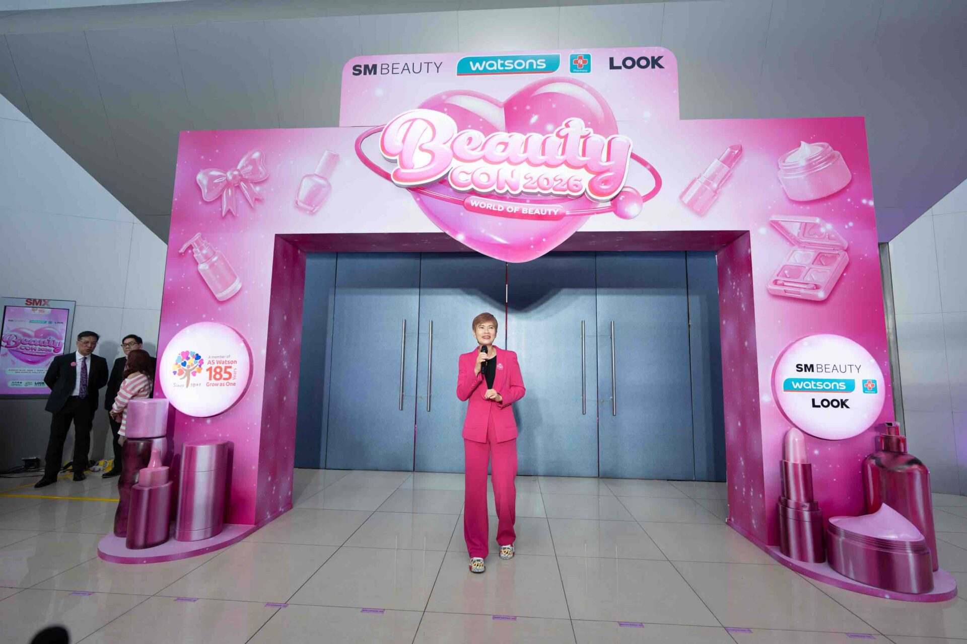 Dr. Malina Ngai, Group CEO of AS Watson welcomes guests at the ribbon ...
